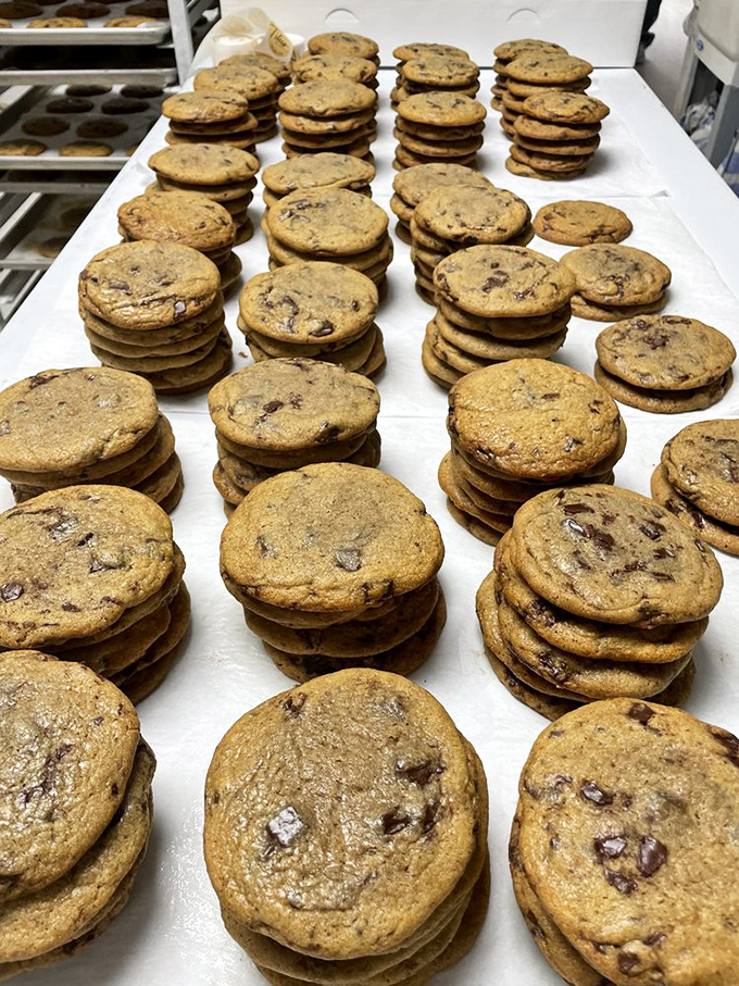 Chocolate chip cookies stacked like poker chips in a game where everyone's a winner. The house advantage? Freshly baked perfection.
