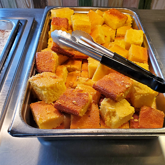 Cornbread squares glowing like little bites of sunshine. They're the supporting actors that steal the show in Louisiana's culinary theater.