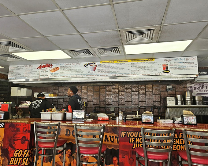 Behind this counter, hot dog artistry happens daily &ndash; no fancy chef coats needed, just pure dedication.