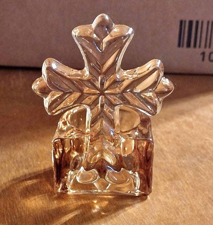 Crystal catches light like memories catch hearts. This delicate piece waits patiently for someone who'll appreciate its sparkle and story.