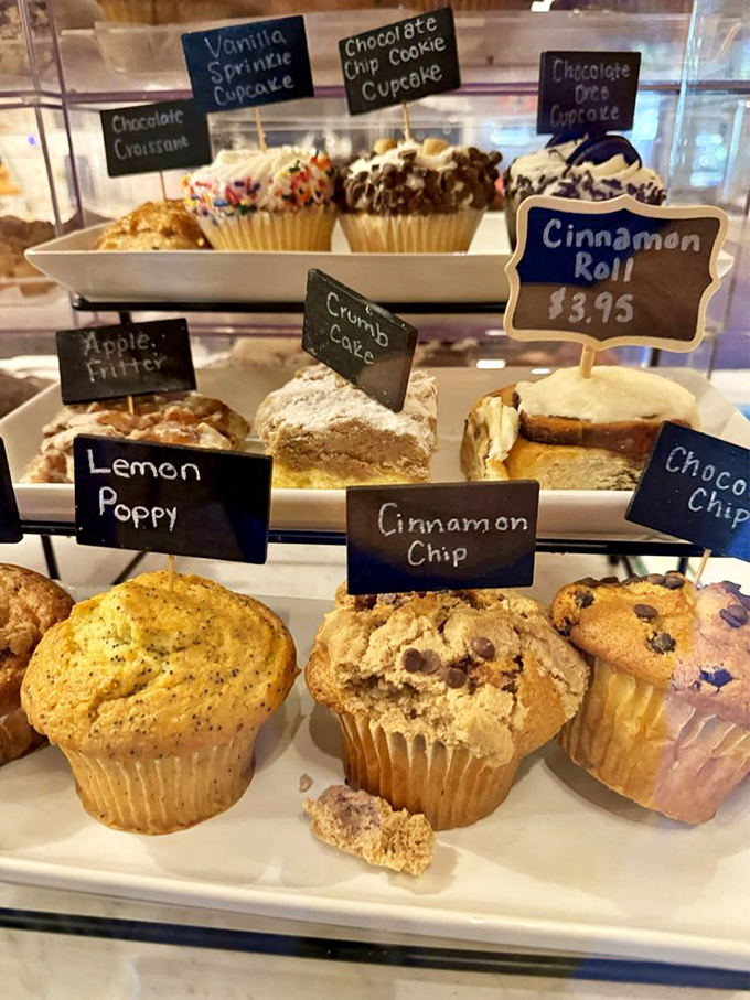 A pastry case that turns grown adults into wide-eyed children, pointing and whispering, "I'll have that one... no, that one!"