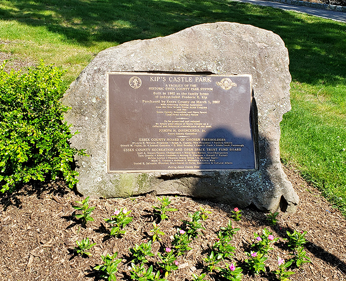 History set in stone. The dedication plaque tells the castle's story, preserving its legacy for future generations of wide-eyed visitors.