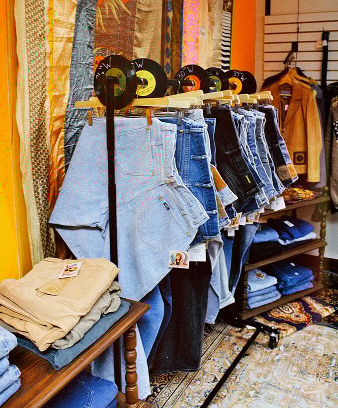 Denim heaven organized by vinyl records&mdash;because your jeans should have as much character as your music collection. That's thrift store poetry.