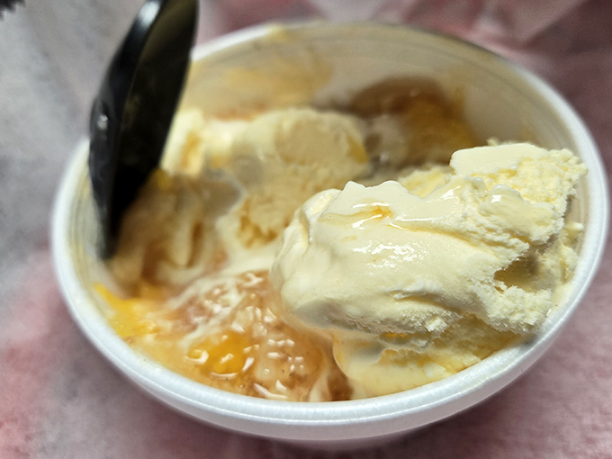 Ice cream that melts with Southern languor, creating rivers of sweetness. The perfect cool finale after a symphony of smoky flavors.