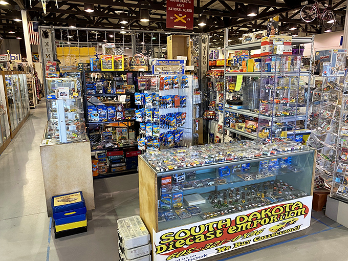 Die-cast dreams and miniature memories fill these cases. That South Dakota Die Cast Department sign promises tiny treasures with enormous nostalgic value.