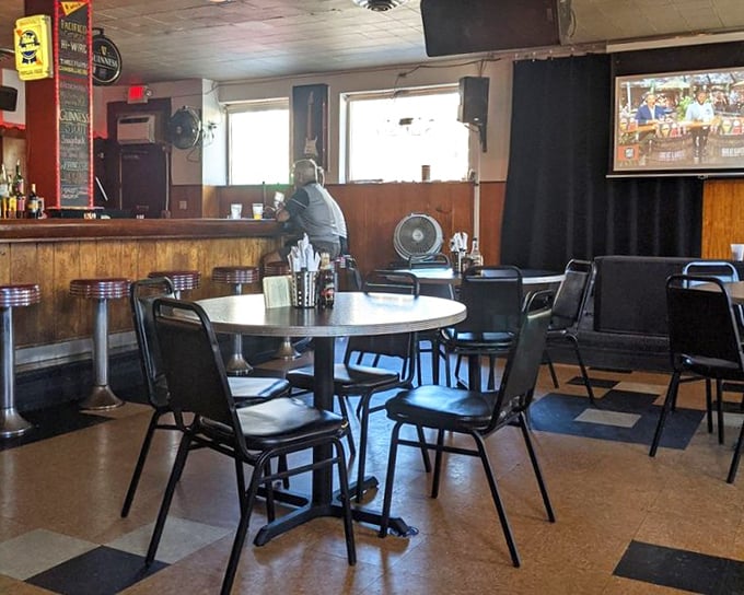 The dining area waits expectantly for its next round of hot dog enthusiasts. Those tables have stories to tell&mdash;if only they could talk between bites.