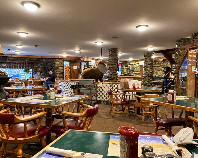 Stone pillars and wooden tables create a dining room that feels like your Alaskan uncle's cabin&mdash;if your uncle were an excellent cook.