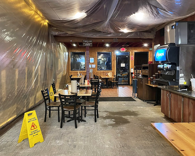 The dining area waits patiently for its next round of barbecue enthusiasts, wooden tables ready to bear the weight of smoky treasures.