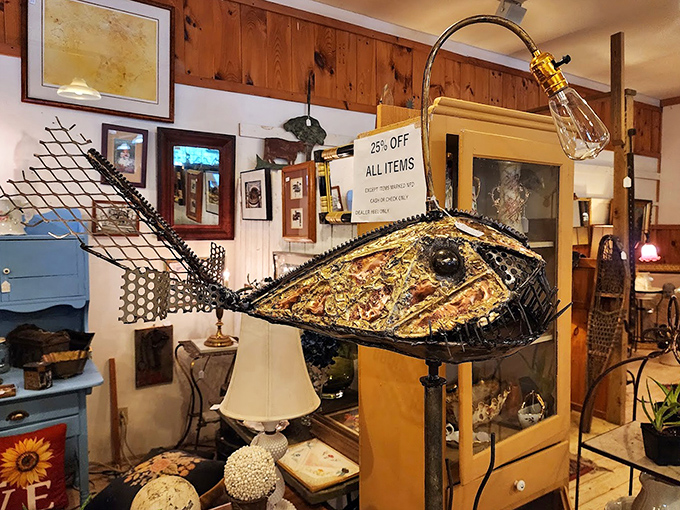 Landscape paintings and vintage furnishings create cozy vignettes that help you envision these pieces in your home.