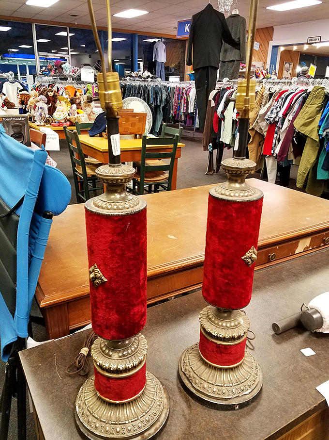 Red velvet lamps that probably illuminated someone's den during the Nixon administration, ready for their comeback tour. 