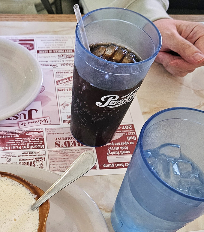 Classic sodas in blue plastic tumblers&mdash;the perfect unpretentious accompaniment to seafood that needs no fancy pairings to shine.