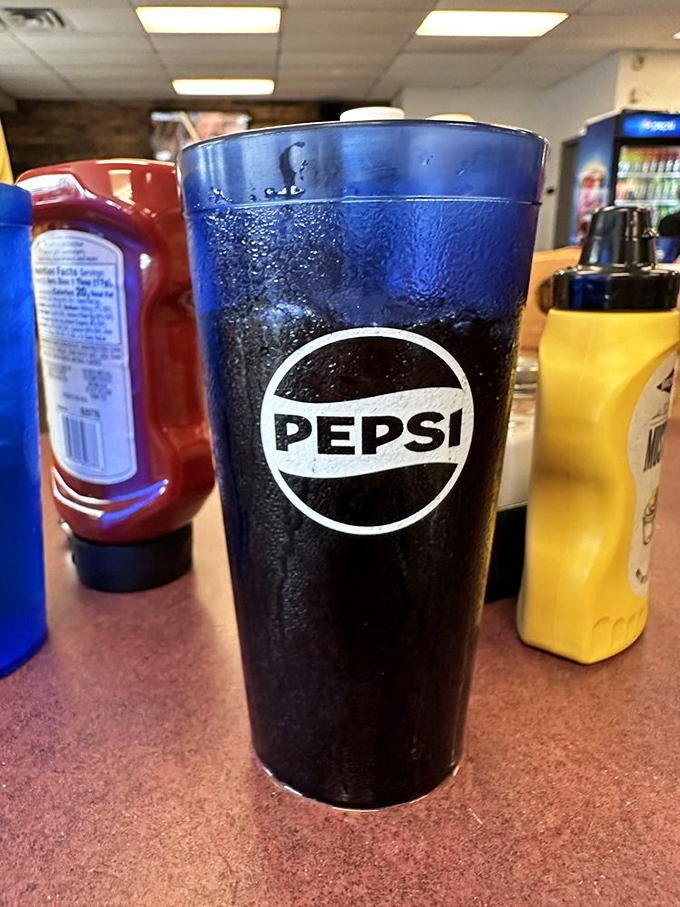 Ice-cold Pepsi in a glass that could double as an Olympic swimming pool. Perfect for washing down those loaded fries.
