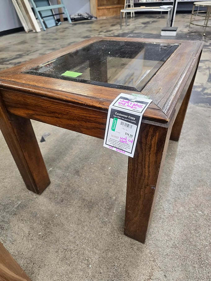 This glass-top coffee table isn't just furniture—it's a conversation waiting to happen in your living room for less than a fancy dinner.