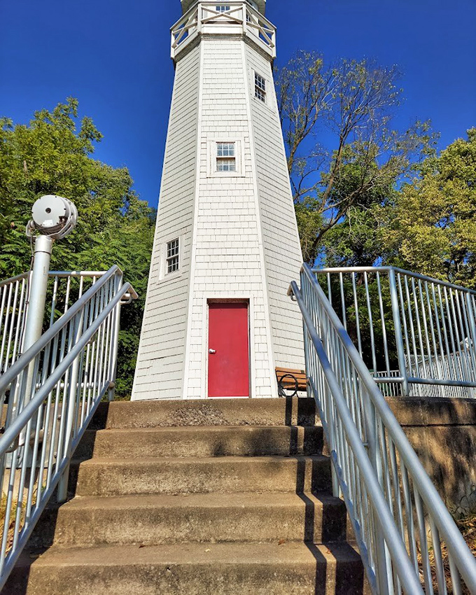 That vibrant red door at the lighthouse base practically screams "adventure awaits!" &ndash; Tom Sawyer would definitely approve.