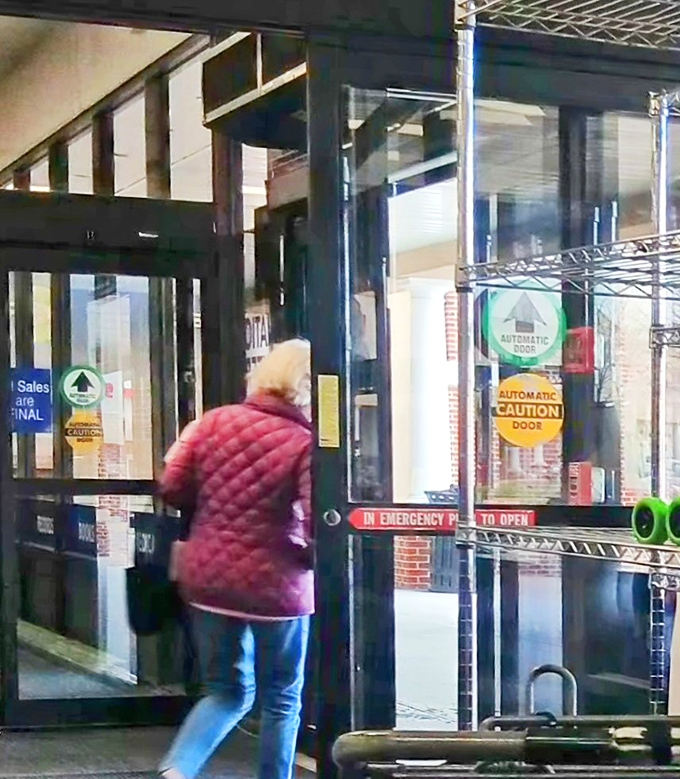 The threshold between ordinary shopping and extraordinary finds. Each exit means someone's leaving with newfound treasures.