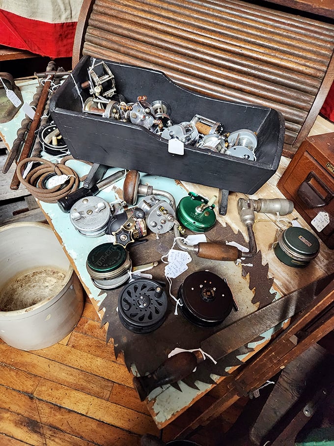 A fisherman's dream display! Vintage reels, tackle, and gear that tell tales of "the one that got away" from generations of anglers.