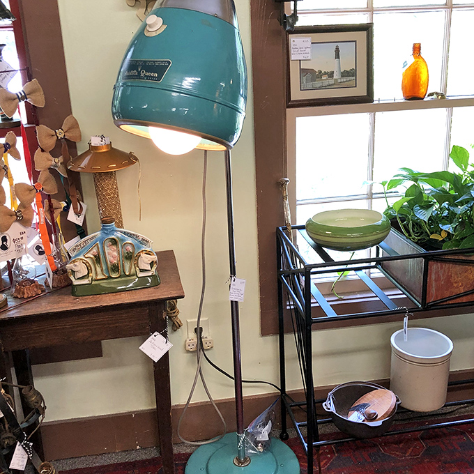That turquoise floor lamp isn't just mid-century modern—it's practically begging to become the statement piece your living room has been missing.