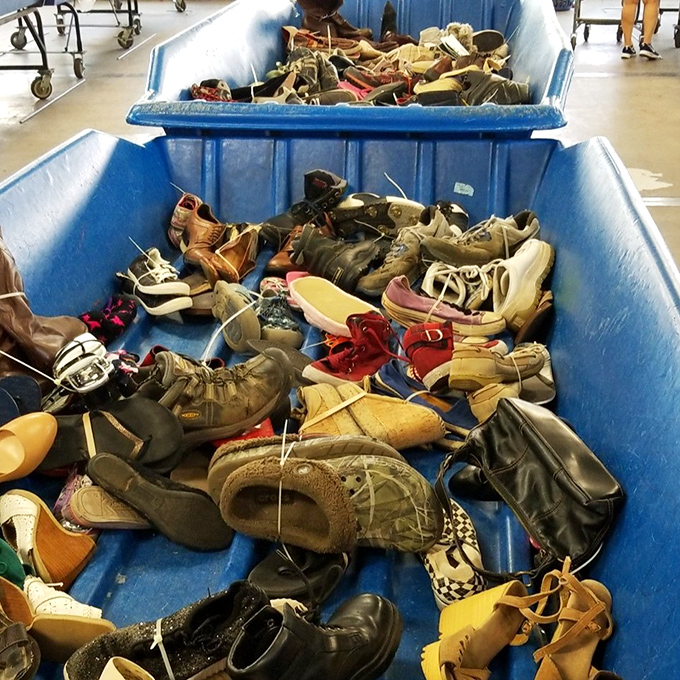 The footwear bin – where single shoes dream of reuniting with their partners and gently worn boots await their second chance at adventure.