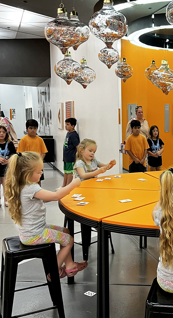 Family fun transcends generations as children discover the magic of optical illusions. That look of wonder is the same whether you're eight or eighty.