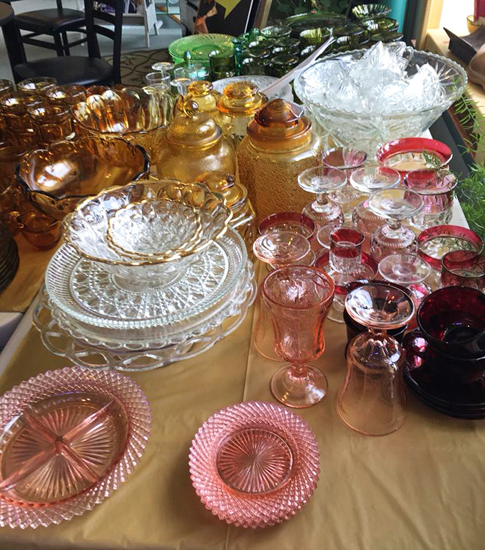 Depression glass heaven! Pink, amber and clear pieces catch the light like jewels, each pattern telling a story of American manufacturing ingenuity.