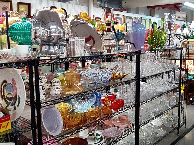 Crystal and glassware catching light like an indoor constellation. One person's "too many glasses" is another's "curated collection."