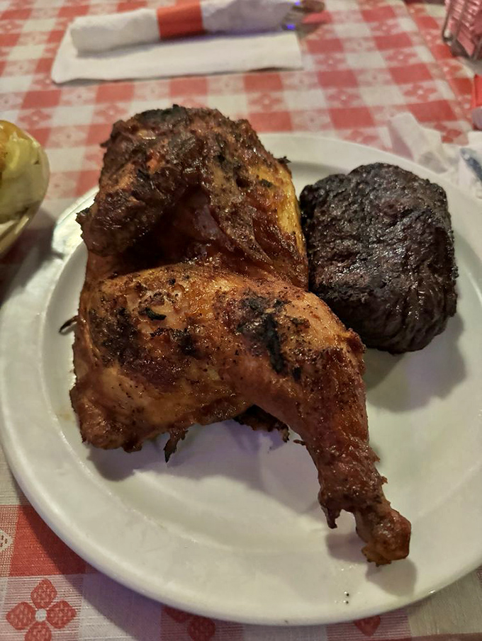 When chicken and steak share a plate, it's not a competition – it's a celebration of grilling mastery that makes vegetarians question their life choices.