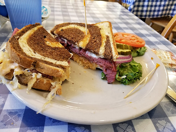 A proper Reuben doesn't need to show off&mdash;the marbled rye, tender corned beef, and sauerkraut speak volumes without saying a word.