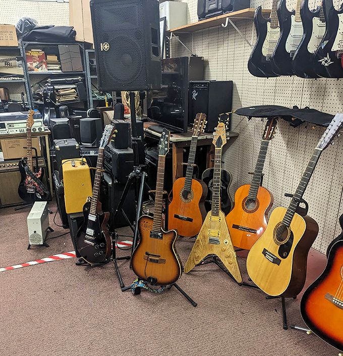 A guitar gallery that would make Eric Clapton pause&mdash;each instrument silently humming with songs yet to be played.