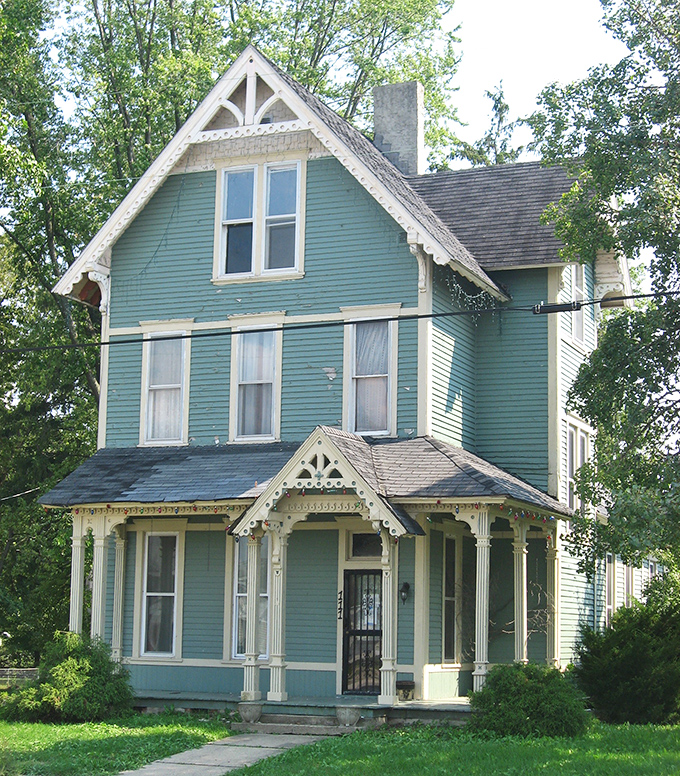 The Seybold House stands as a teal Victorian time capsule, complete with the kind of porch where lemonade was meant to be sipped.