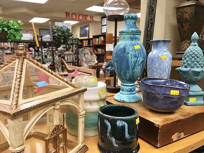 Ceramic storytellers lined up for adoption. These blue vases and decorative pieces are just waiting to become the conversation starter at your next dinner party.