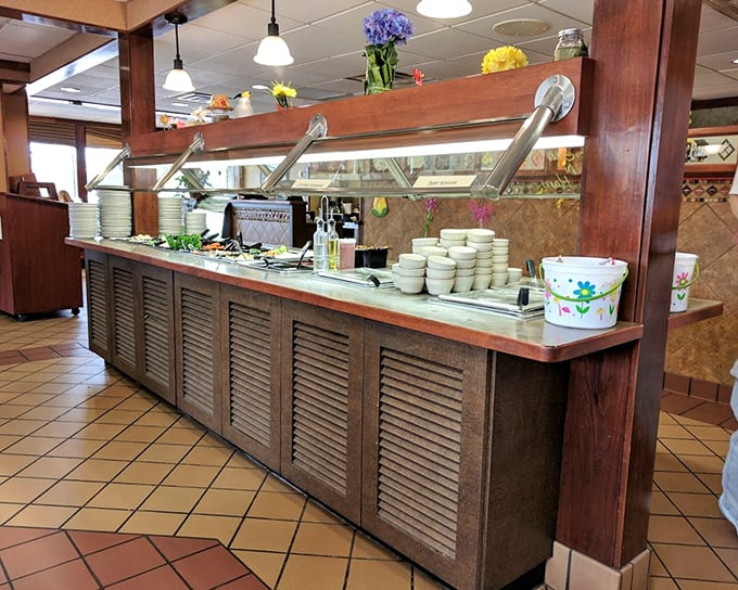 The salad bar awaits your creative touch. In the great buffet tradition, your plate becomes your canvas and vegetables your medium of expression.
