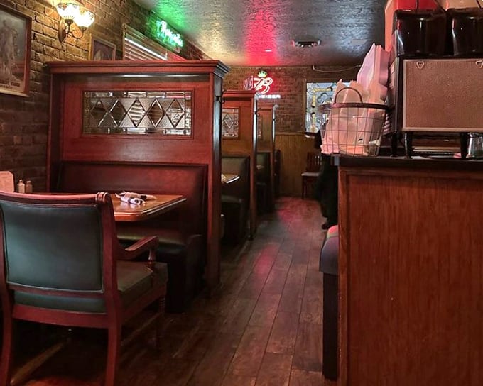 Classic booths where privacy meets comfort&mdash;the kind of seating arrangement that's witnessed first dates, business deals, and "we need to talk" conversations.