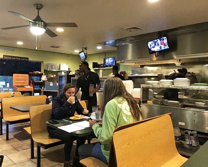 The bustling interior during peak hours shows this isn't just a restaurant, it's a community gathering spot.