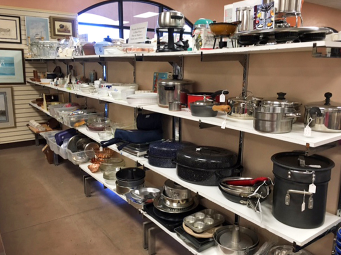 Cookware heaven for culinary enthusiasts on a budget. Julia Child would approve of these perfectly seasoned pots and pans awaiting their next kitchen adventure.