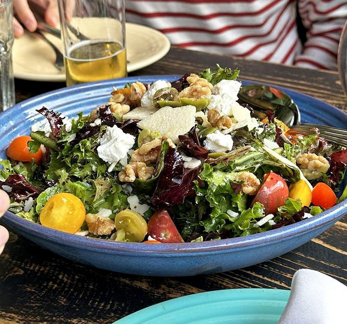 Even the salads deserve attention&mdash;a vibrant bowl of greens, cheese, and seasonal produce that doesn't feel like a compromise.