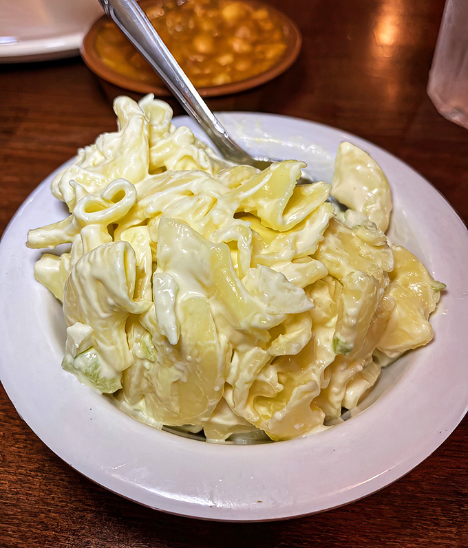 Macaroni salad that doesn't try to reinvent itself with truffle oil or microgreens. Sometimes comfort food should just be comforting.