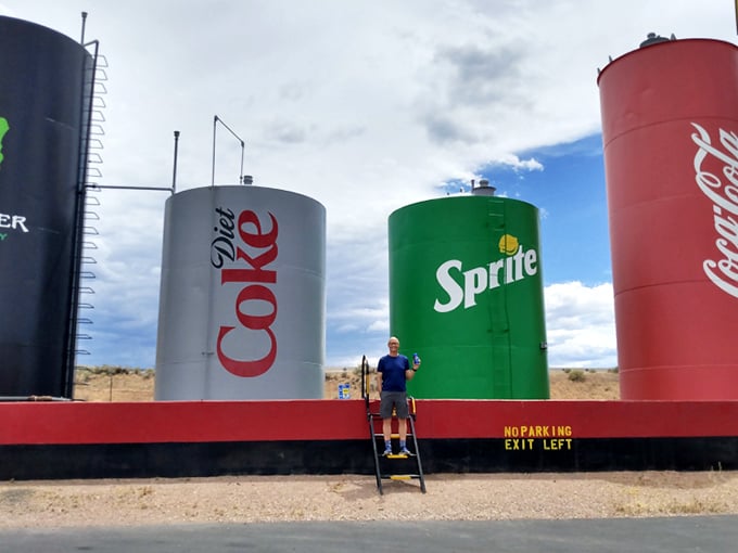 Scale becomes hilariously apparent when humans stand beside these towering tributes to America's favorite beverages.