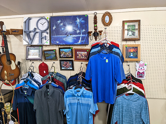 Wall art meets wardrobe: Men's shirts hang beneath framed scenes, offering both conversation pieces and conversation starters for your next gathering.