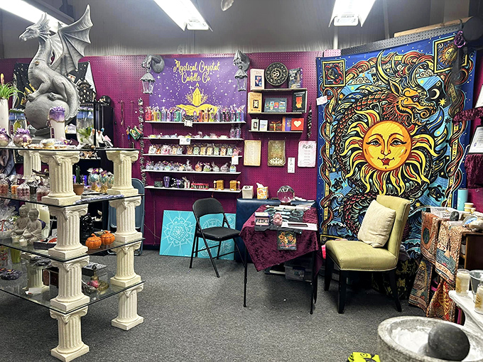 A mystical vendor space where dragons, crystals, and celestial tapestries create an atmosphere that's pure bohemian magic on a budget.