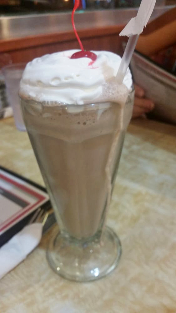 This isn't just a milkshake&mdash;it's dessert with a straw. That cherry and whipped cream crown says "I'm worth every calorie."