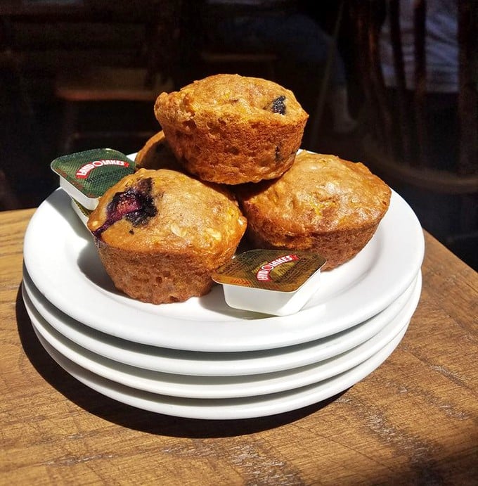 These muffins aren't just breakfast, they're little portable celebrations waiting to brighten your morning with bursts of fruit and buttery crumbs.