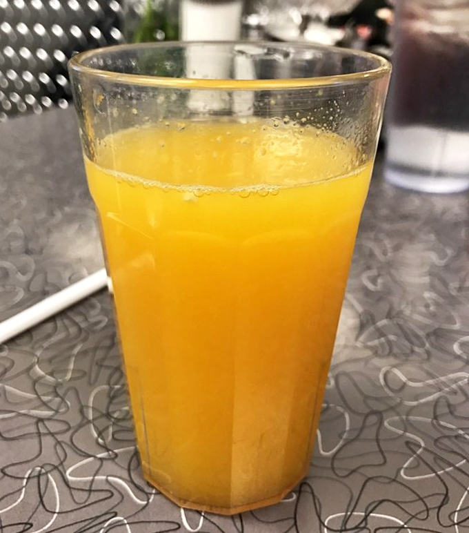 Fresh-squeezed orange juice in a proper glass &ndash; none of that concentrate nonsense your kids try to pass off.