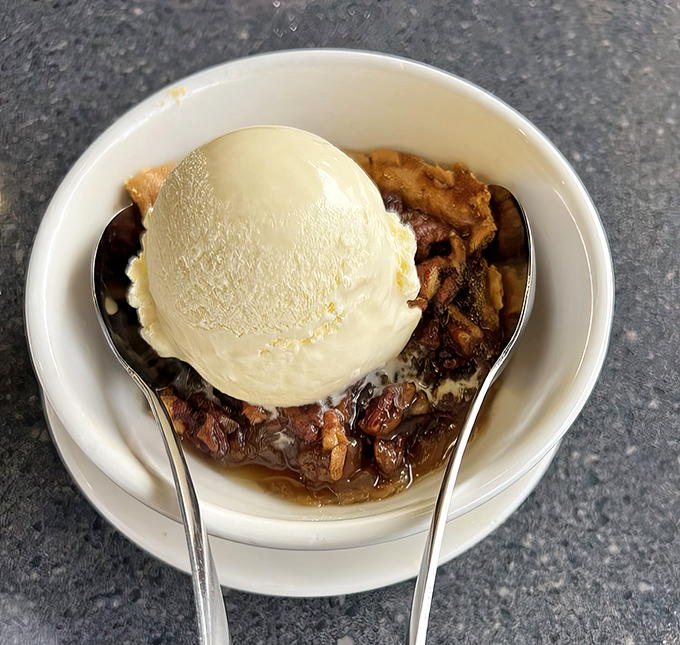 This isn't just dessert; it's therapy in a bowl. Warm pecan pie meets cold ice cream in a temperature tango that soothes the soul.