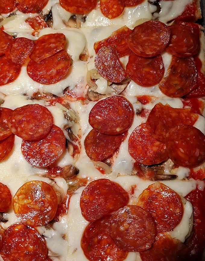 Pepperoni that curls into little flavor cups, creating pools of savory goodness atop a perfect cheese canvas&mdash;this is pizza engineering at its finest.