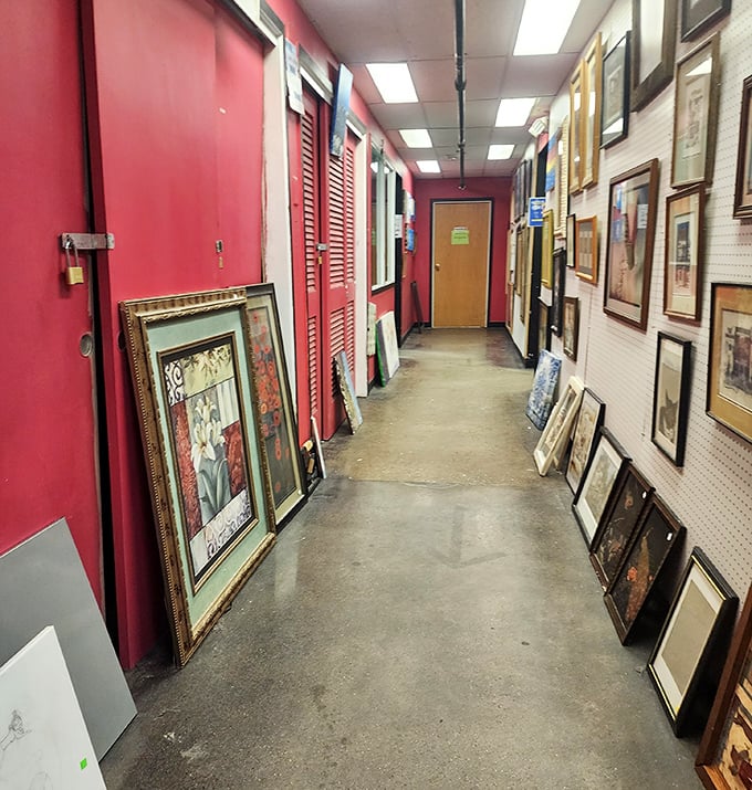 The art corridor feels like a gallery where every piece is actually affordable. That framed poster might be your living room's missing personality.