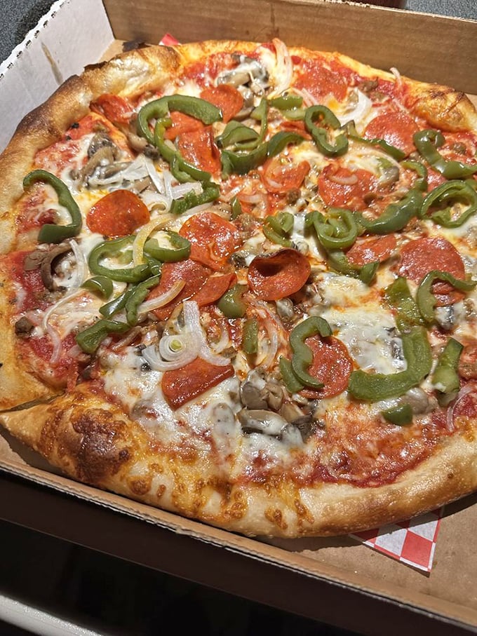 This isn't just a pizza with toppings&mdash;it's a masterclass in balance, where pepperoni, green peppers, and mushrooms live in perfect harmony.