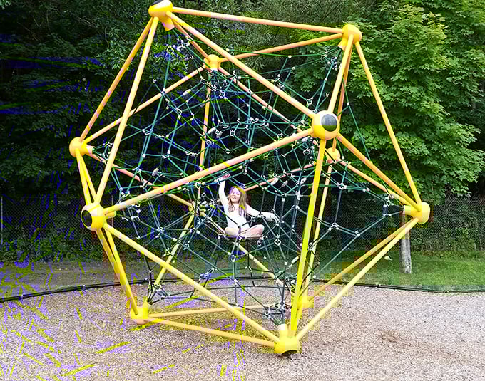 Childhood joy in geometric form. This spider-web climbing structure proves that Bomoseen State Park understands kids need adventure as much as adults need relaxation.