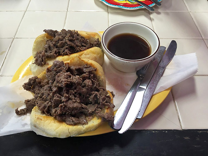 Prime rib dip on a hoagie that's clearly been hitting the gym—this sandwich means business and brings the flavor.