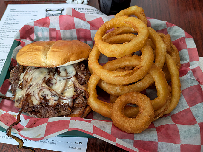 A burger that's not playing games, with melted cheese cascading down the sides like a dairy waterfall of dreams.