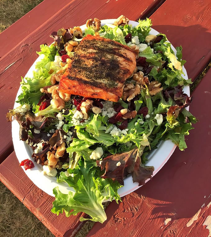 Who said seafood can't do salad? This salmon masterpiece brings together the garden and ocean in a harmony that would make Neptune himself applaud.